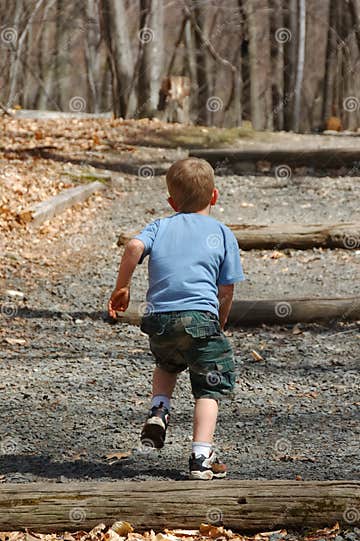 Little boy running stock image. Image of forest, fast, shadows - 700527