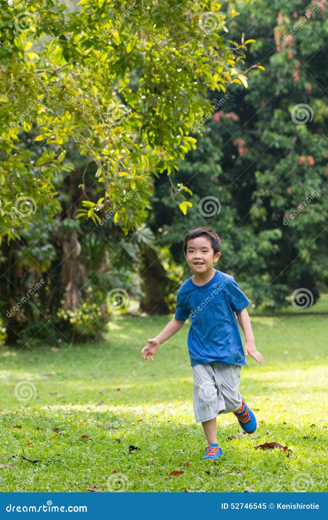 Little Boy Running in the Park Stock Image - Image of spring, field ...