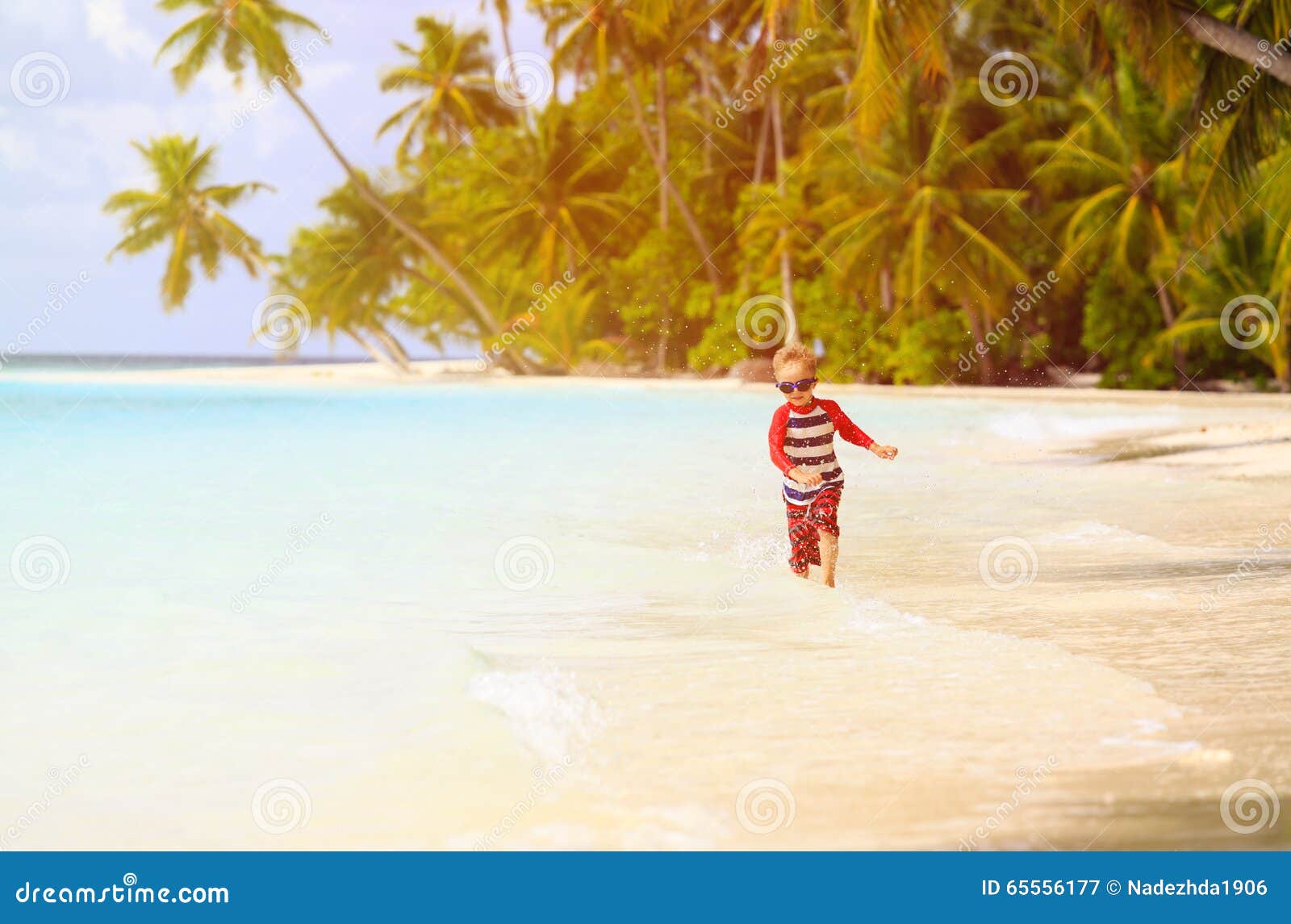 Little Boy Running Splashing Water on Beach Stock Image - Image of ...