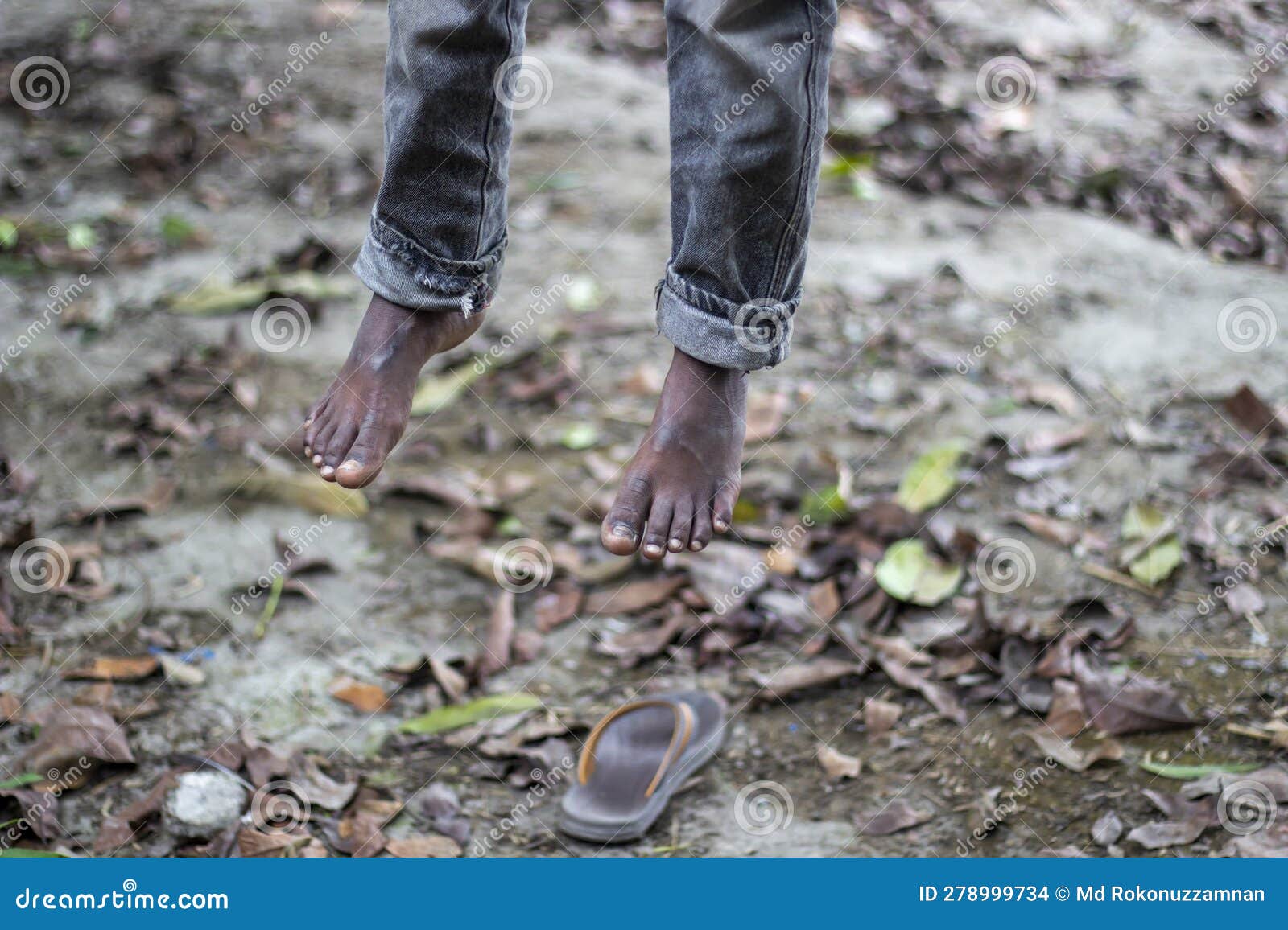 The Little Boy& X27;s Legs are Dangling from Above Stock Photo - Image ...