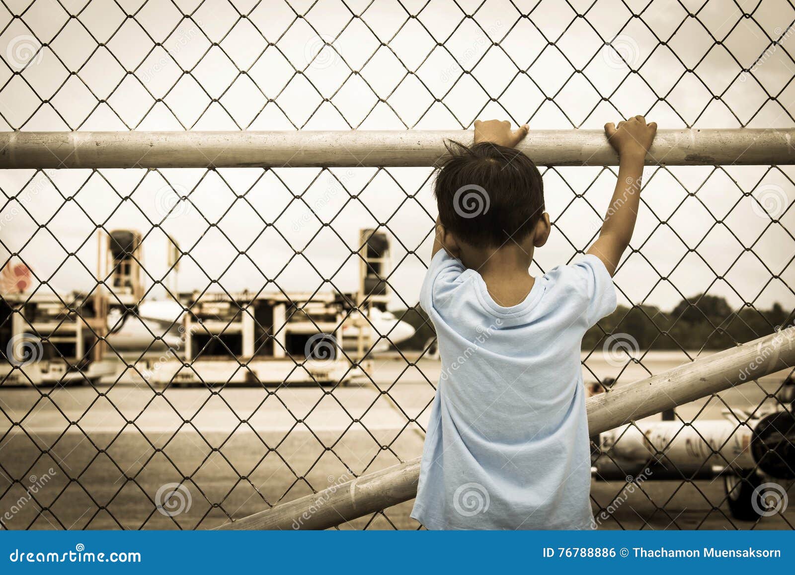 Little Boy Sad Standing Alone Stock Photo - Image of lock, iron: 76788886