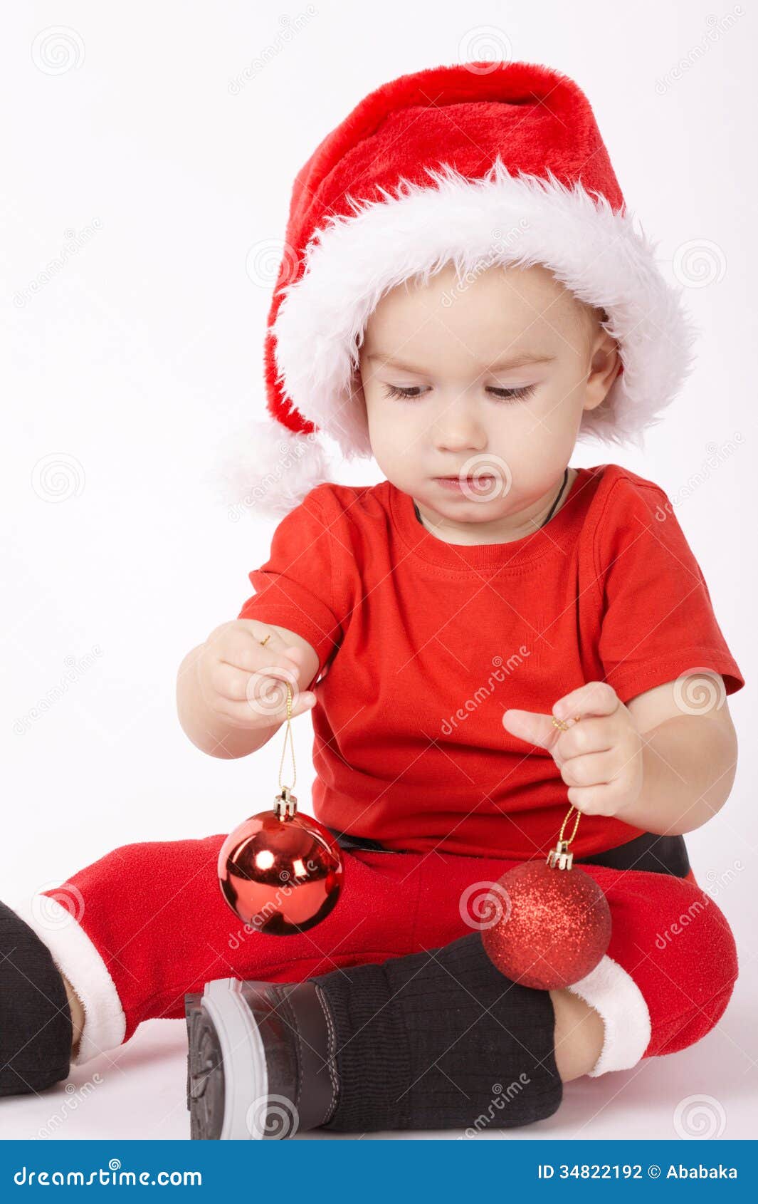 Little boy with Santa hat stock photo. Image of isolated - 34822192