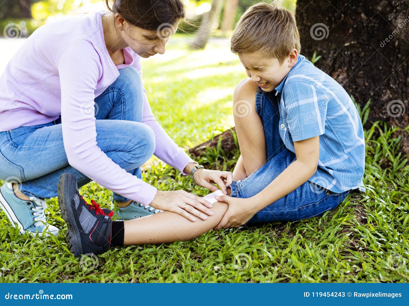 Little Boy Scraped His Leg while Playing Stock Image - Image of help ...