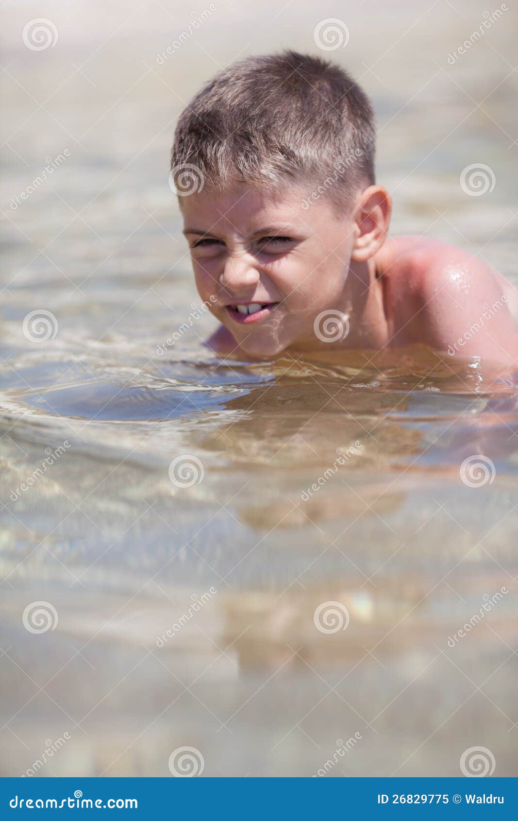 Little boy in the sea stock image. Image of beautiful - 26829775