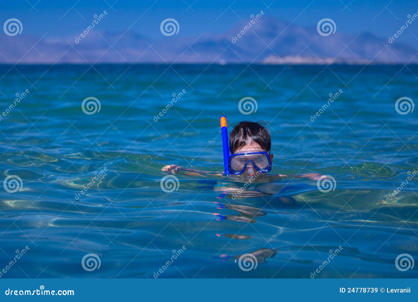 A Little Boy in a Sea with a Mask and Snorkel Stock Image - Image of ...