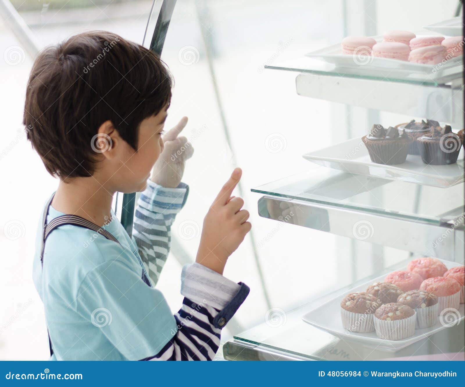 Little Boy Selecting Cake at the Bakery Shop Stock Photo - Image of ...