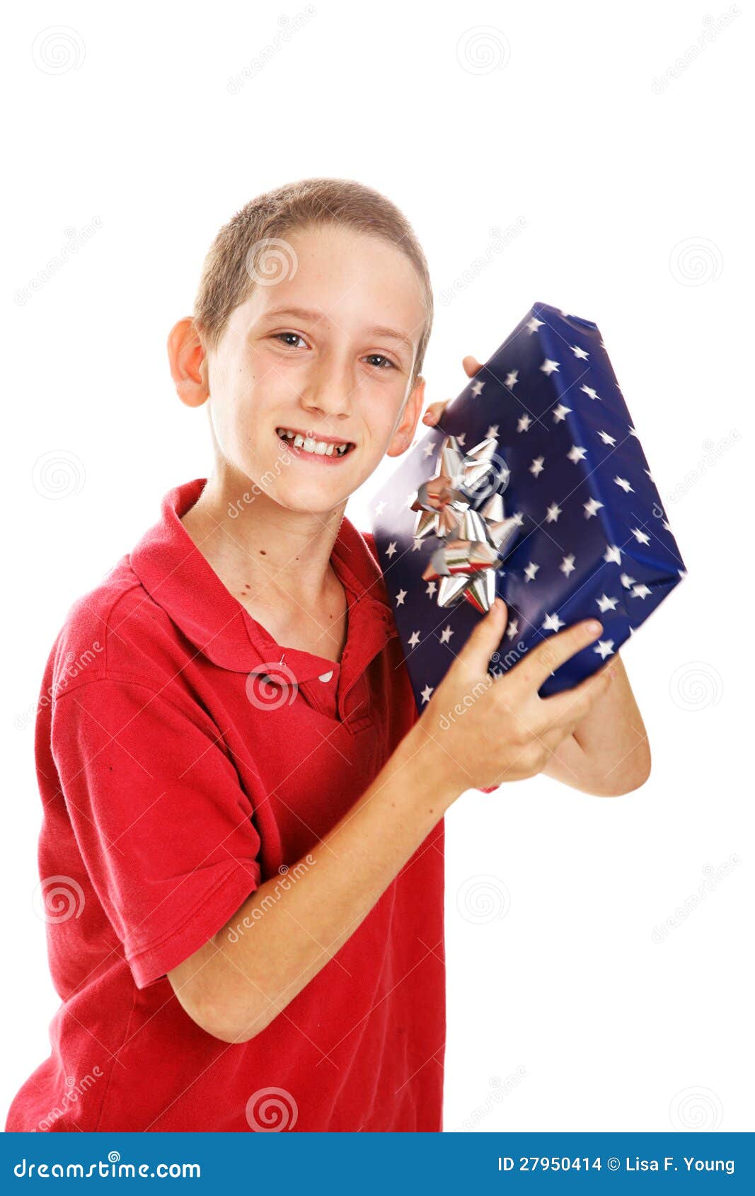 Little Boy Shaking Holiday Gift Stock Photo - Image of gift, shaking ...