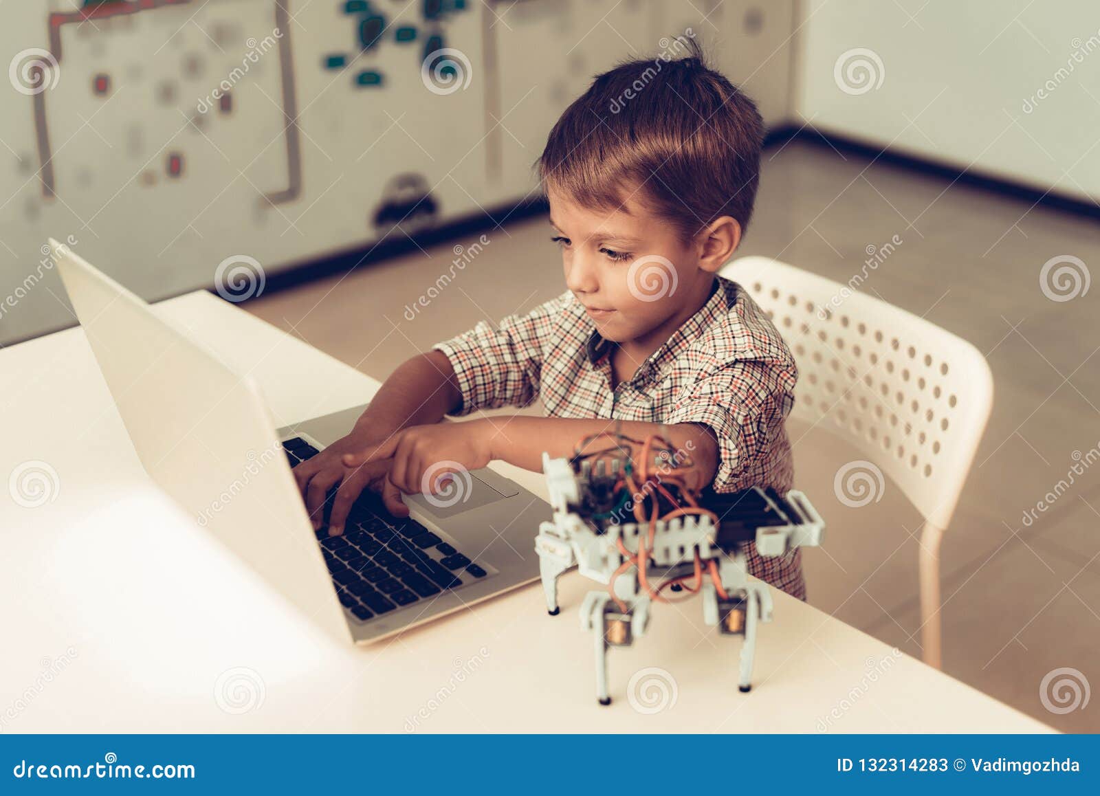 Little Boy in Shirt Programming Robot at Home. Stock Image - Image of ...
