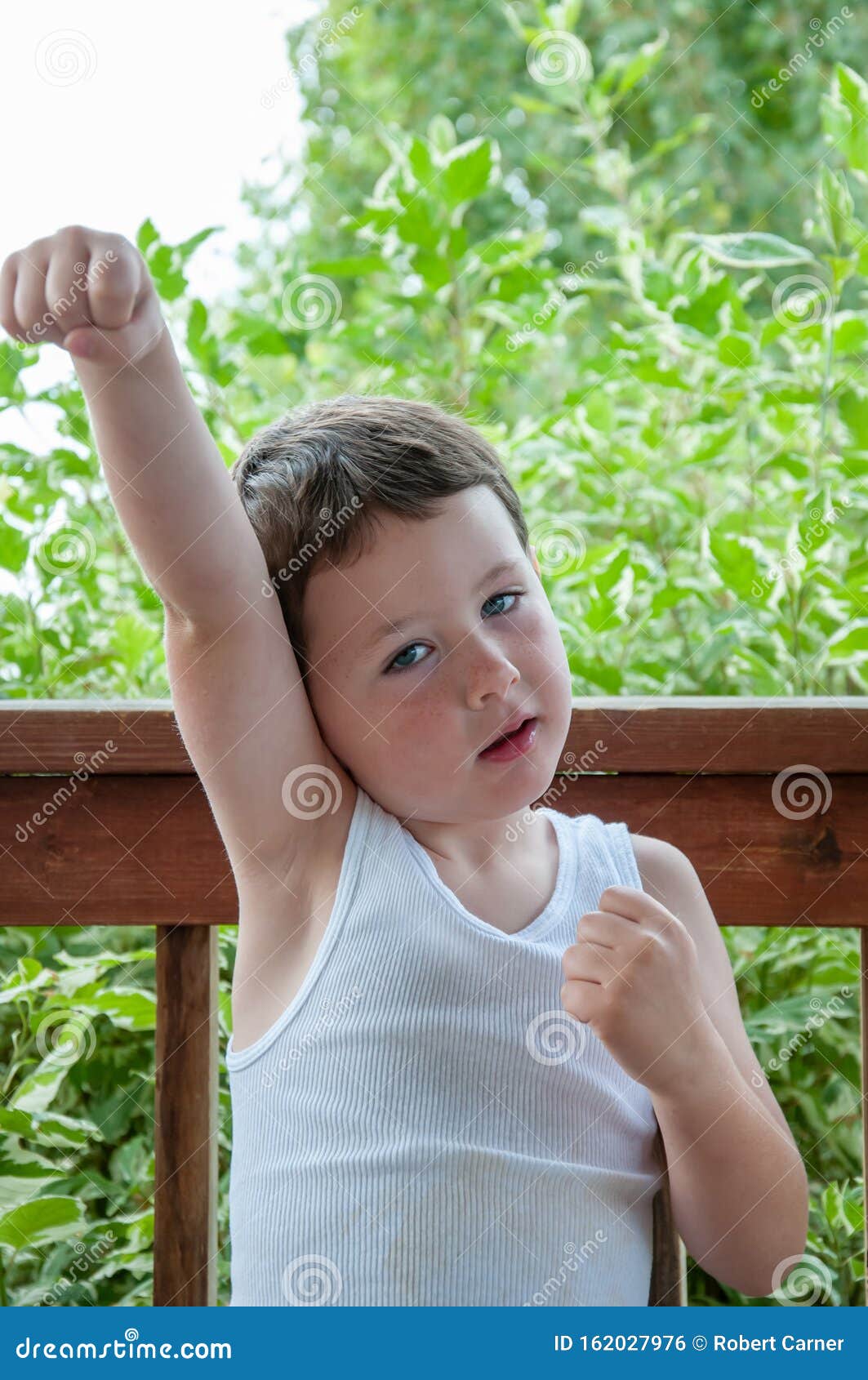 Little Boy Showing How Tough he is so You Better Look Out. Stock Photo ... Little Boy Showing How Tough he is so You Better Look Out. Stock Photo ...