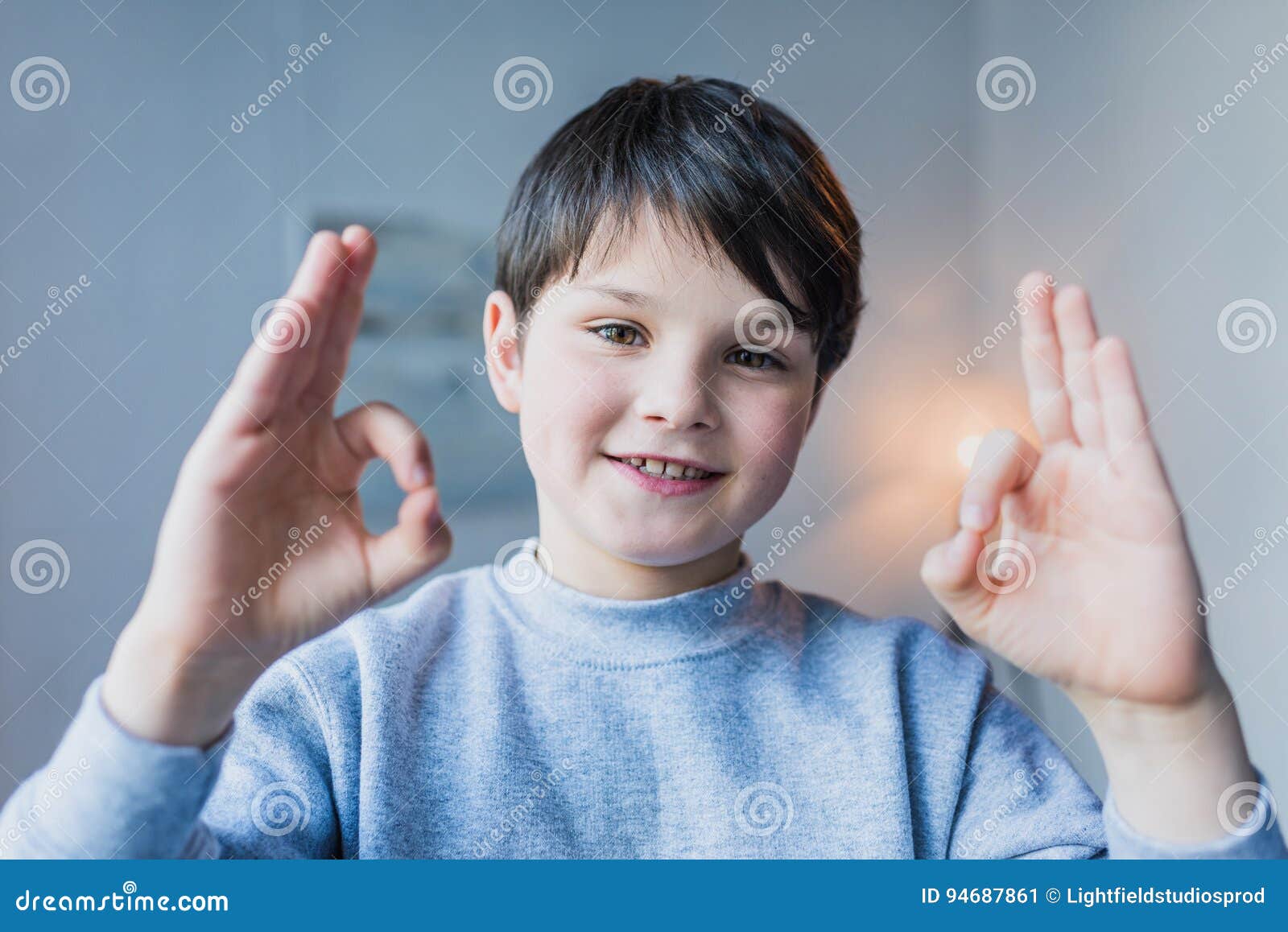 Little Boy Showing Ok Sign and Smiling at Camera Stock Image - Image of ...