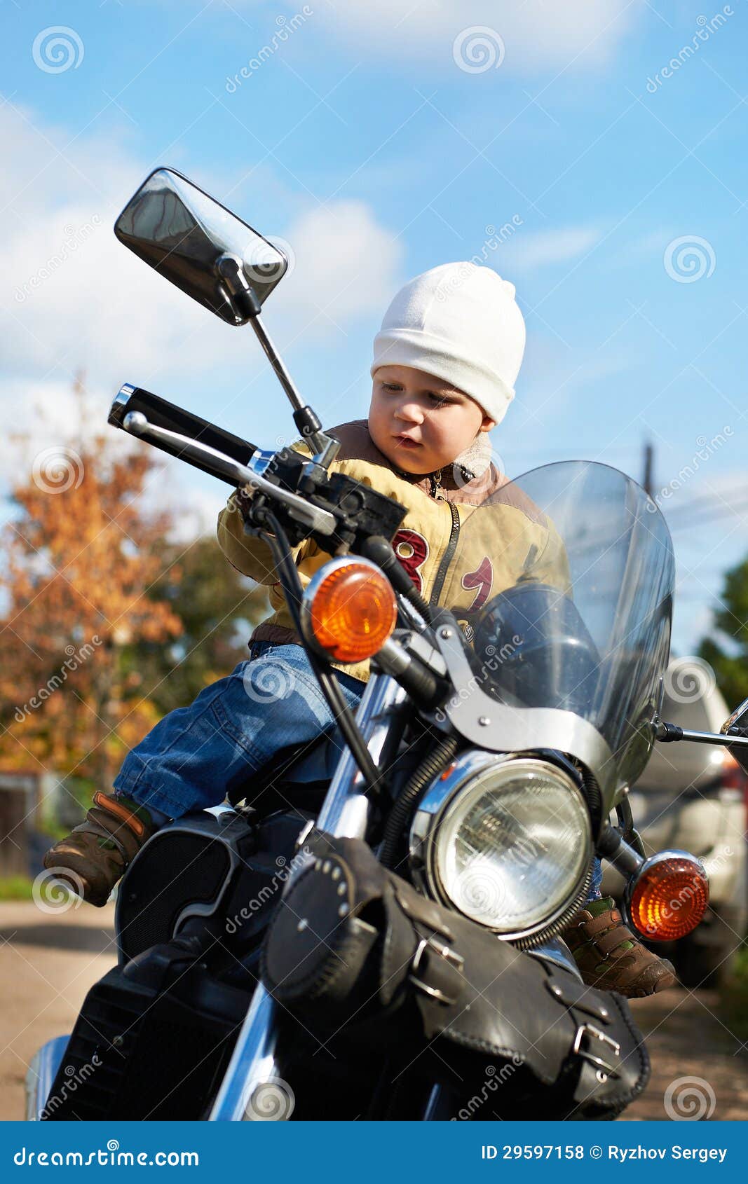 Little Boy Sits on Motorcycle Stock Photo - Image of little, innocence ...