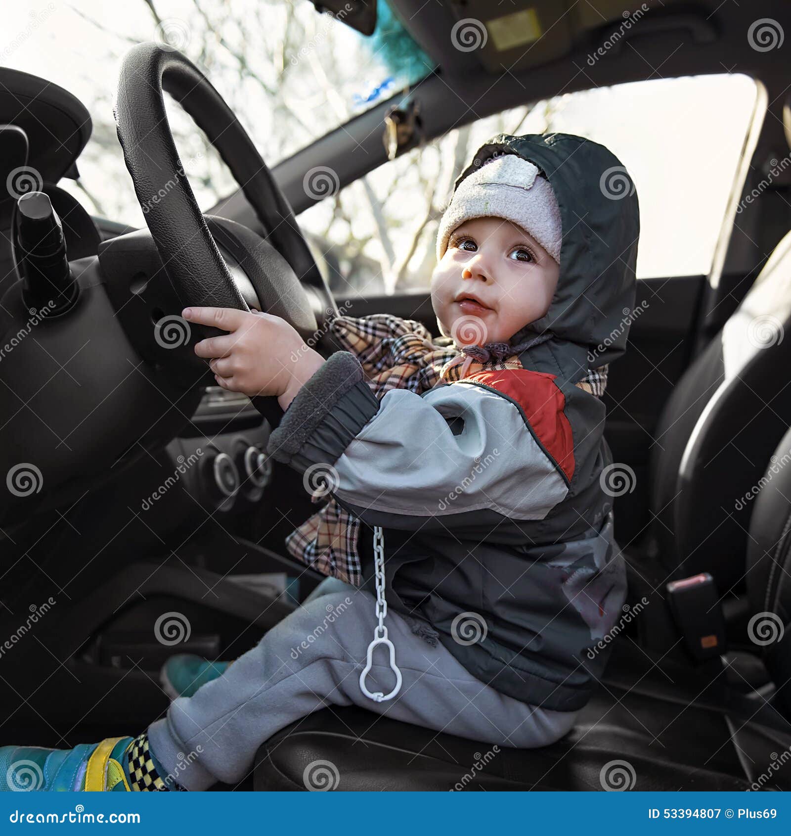Little Boy Sitting Behind the Wheel of a Car Stock Image - Image of ...