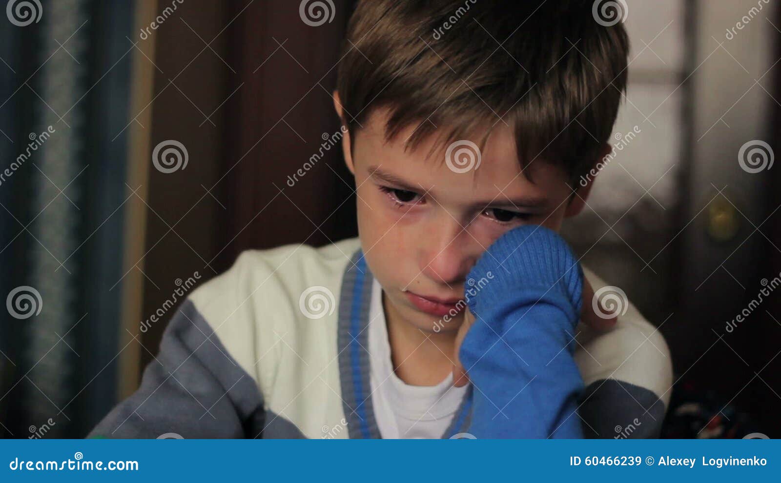 Little Boy Sitting at a Desk Crying, Tears on His Stock Video - Video ...