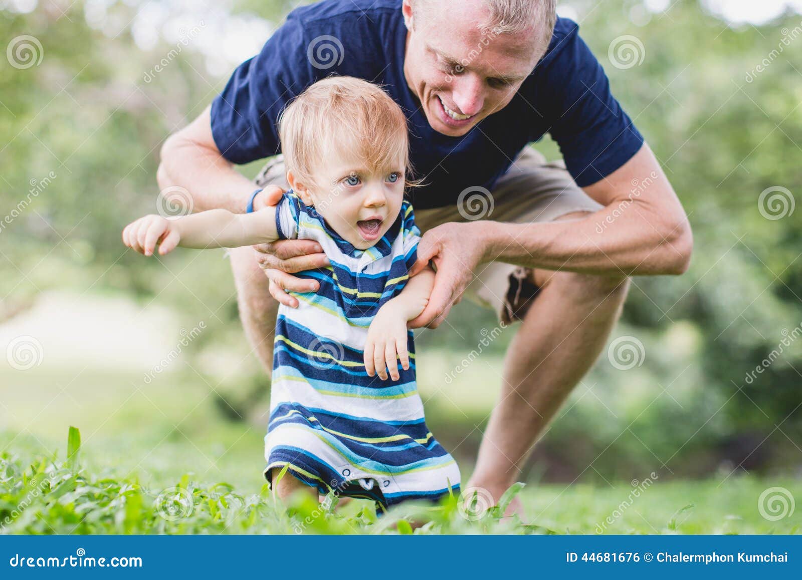 A Little Boy Sitting on His Father, Balancing Editorial Photo - Image ...