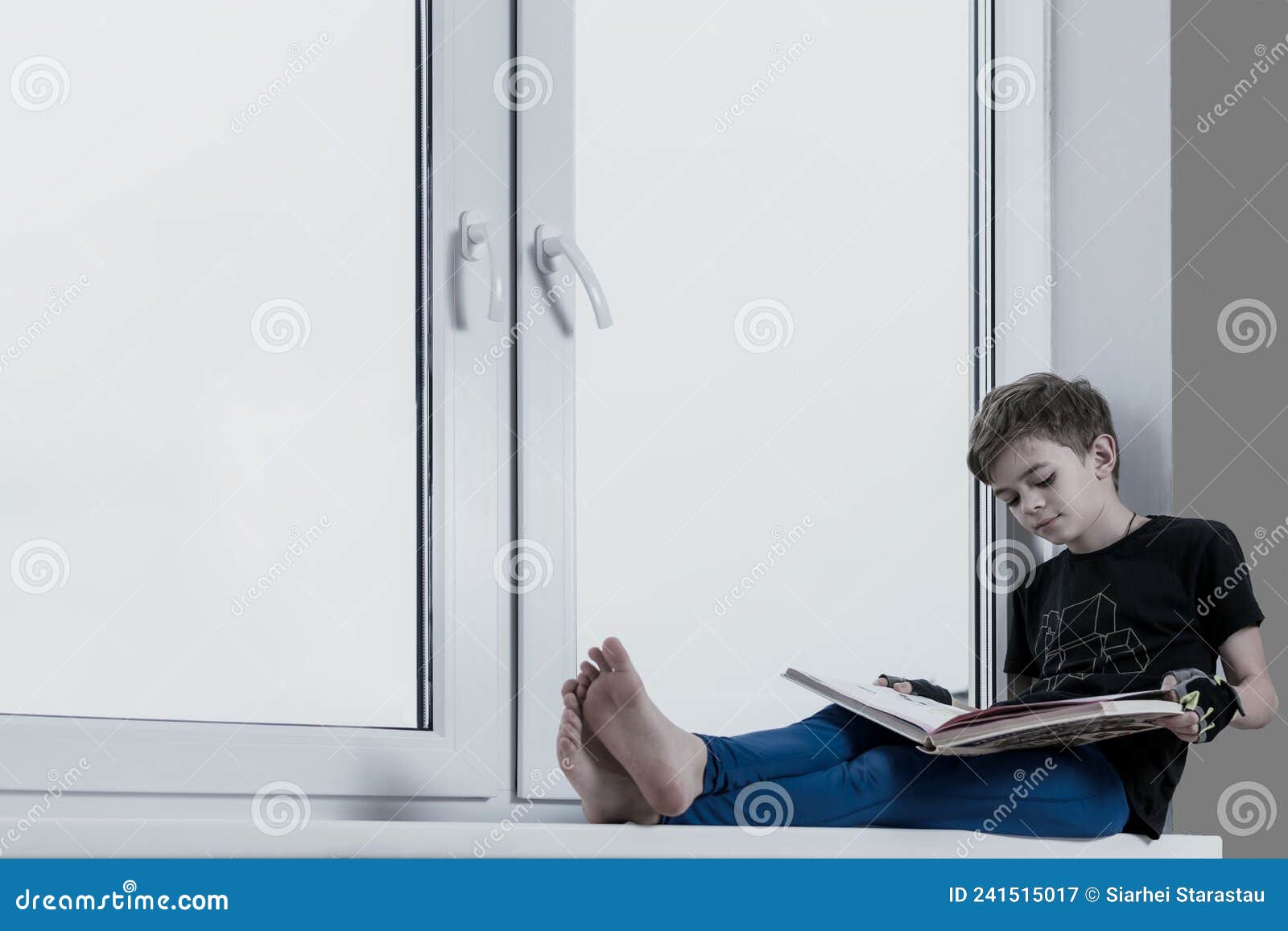 A Little Boy is Sitting Near the Window Stock Image - Image of indoors ...