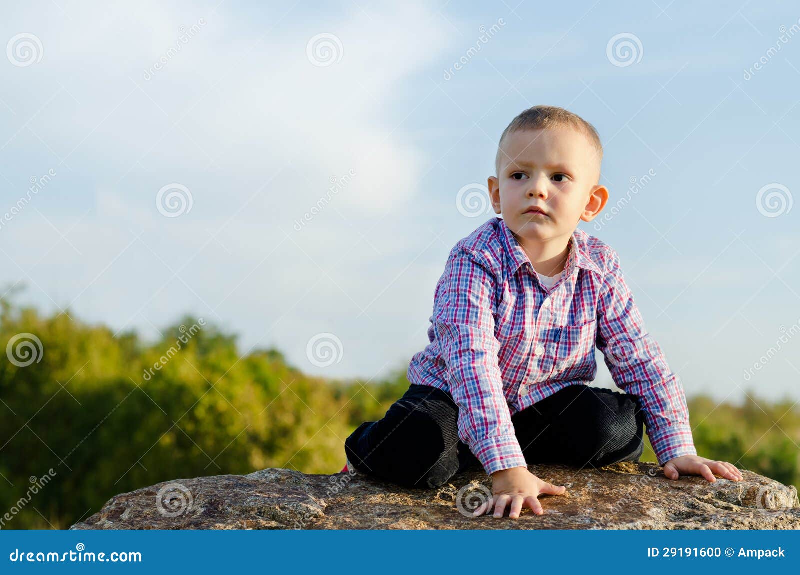 Little Boy Sitting on a Rock Stock Photo - Image of little, alone: 29191600