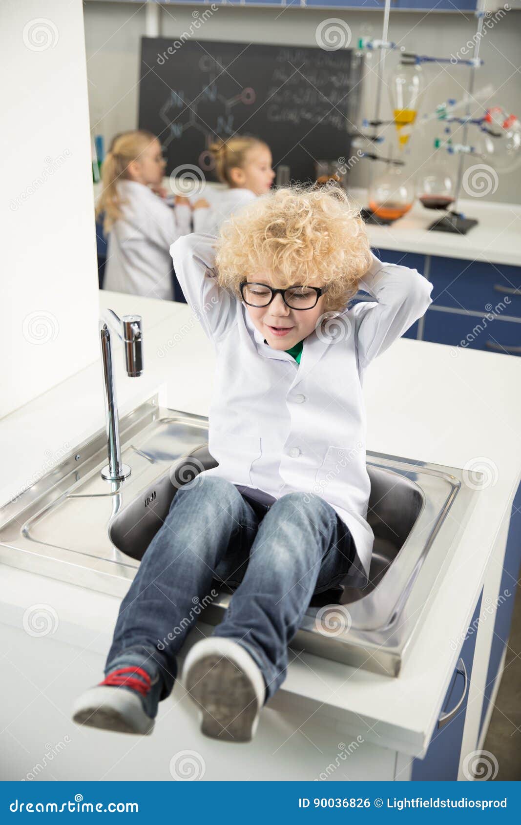 Little Boy Sitting in Sink in Science Laboratory Stock Photo - Image of ...