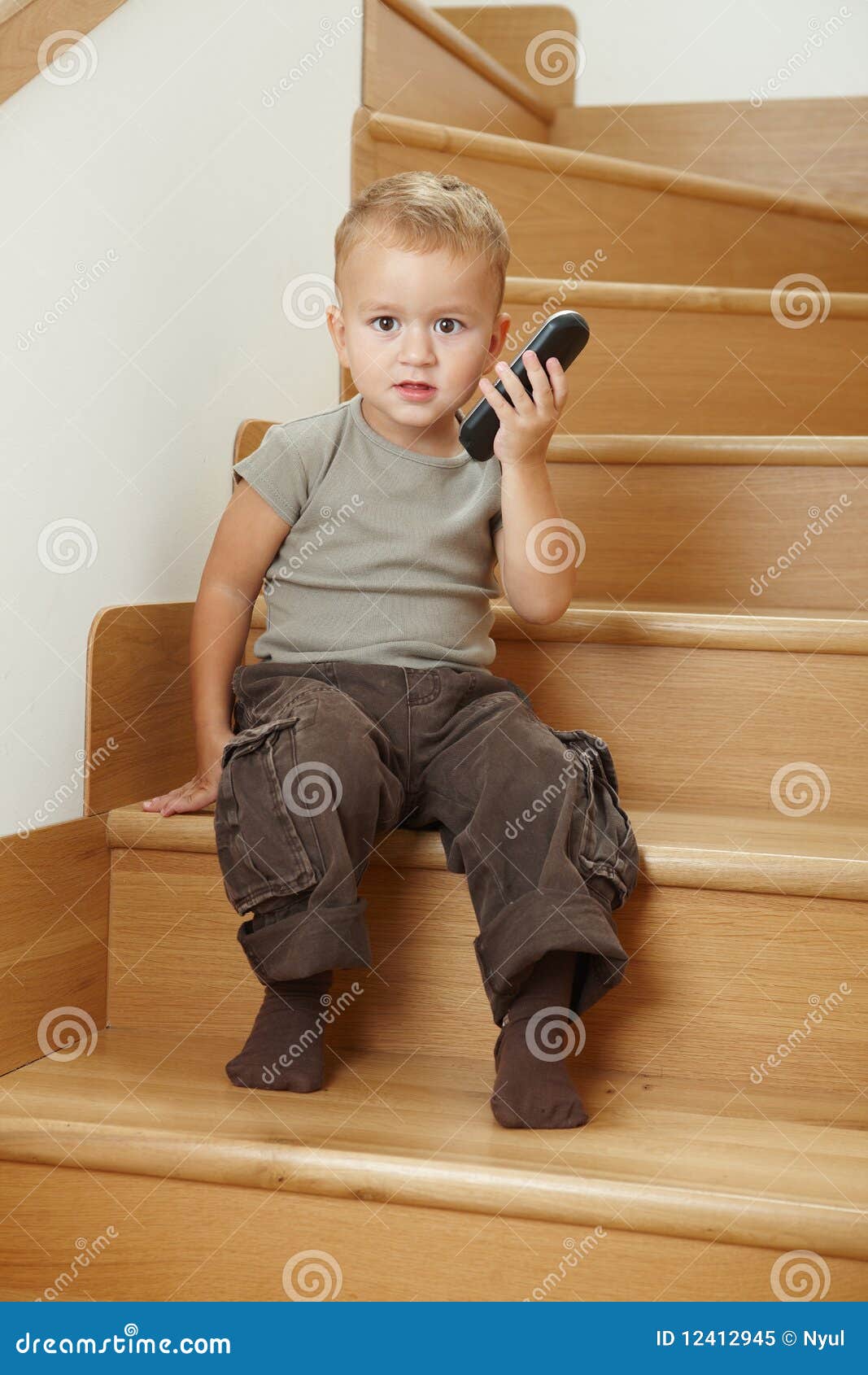 Little Boy Sitting on Stairs Stock Image - Image of carefree, face ...