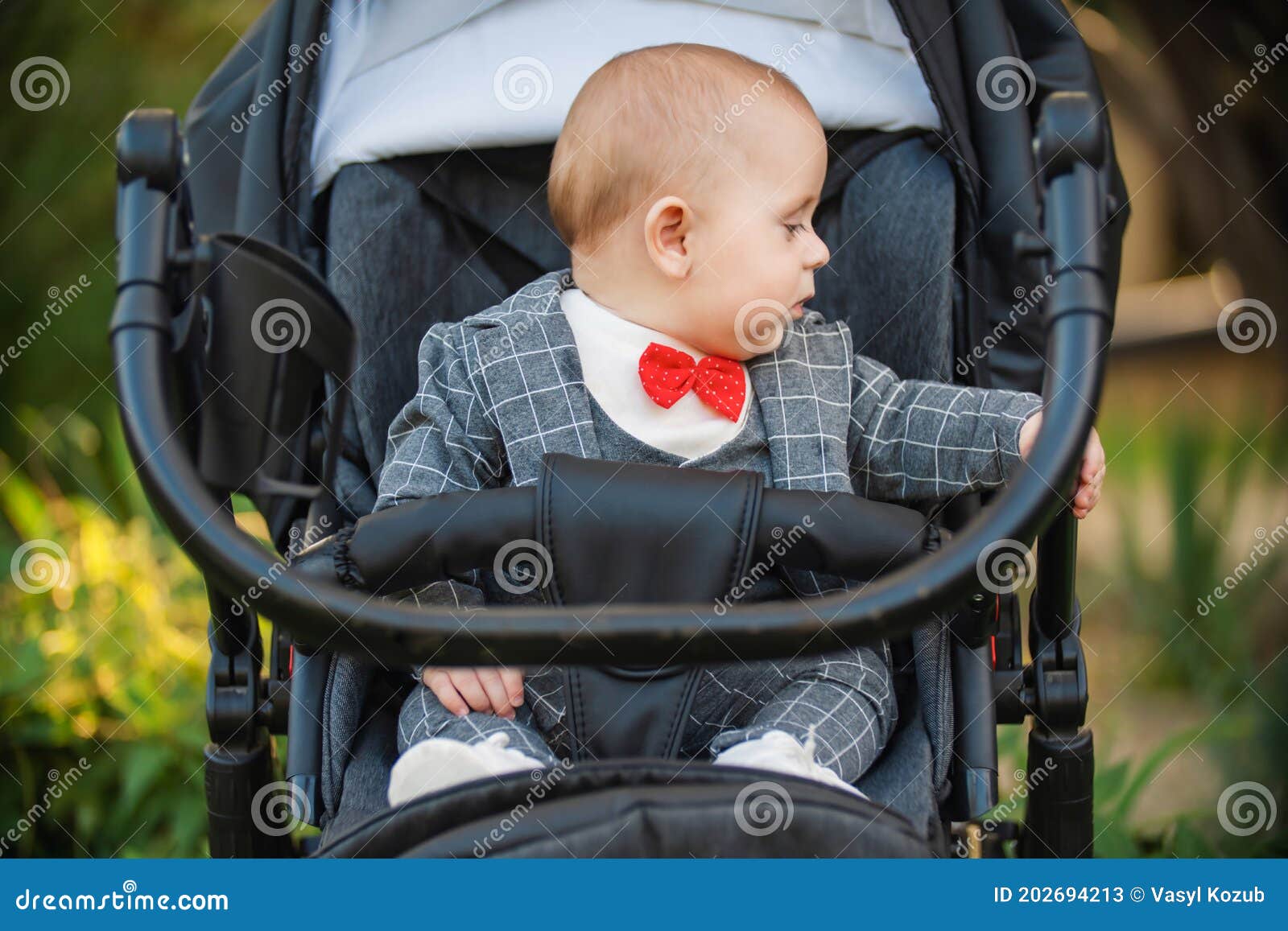 Little Boy Sitting in a Stroller Stock Image - Image of adorable ...