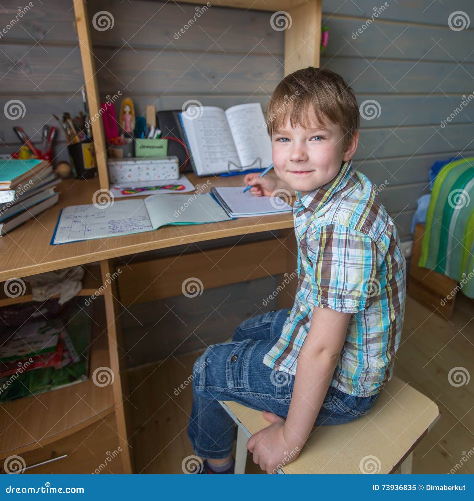 Little Boy Sitting at the Table Doing School Homework. Education. Stock ...