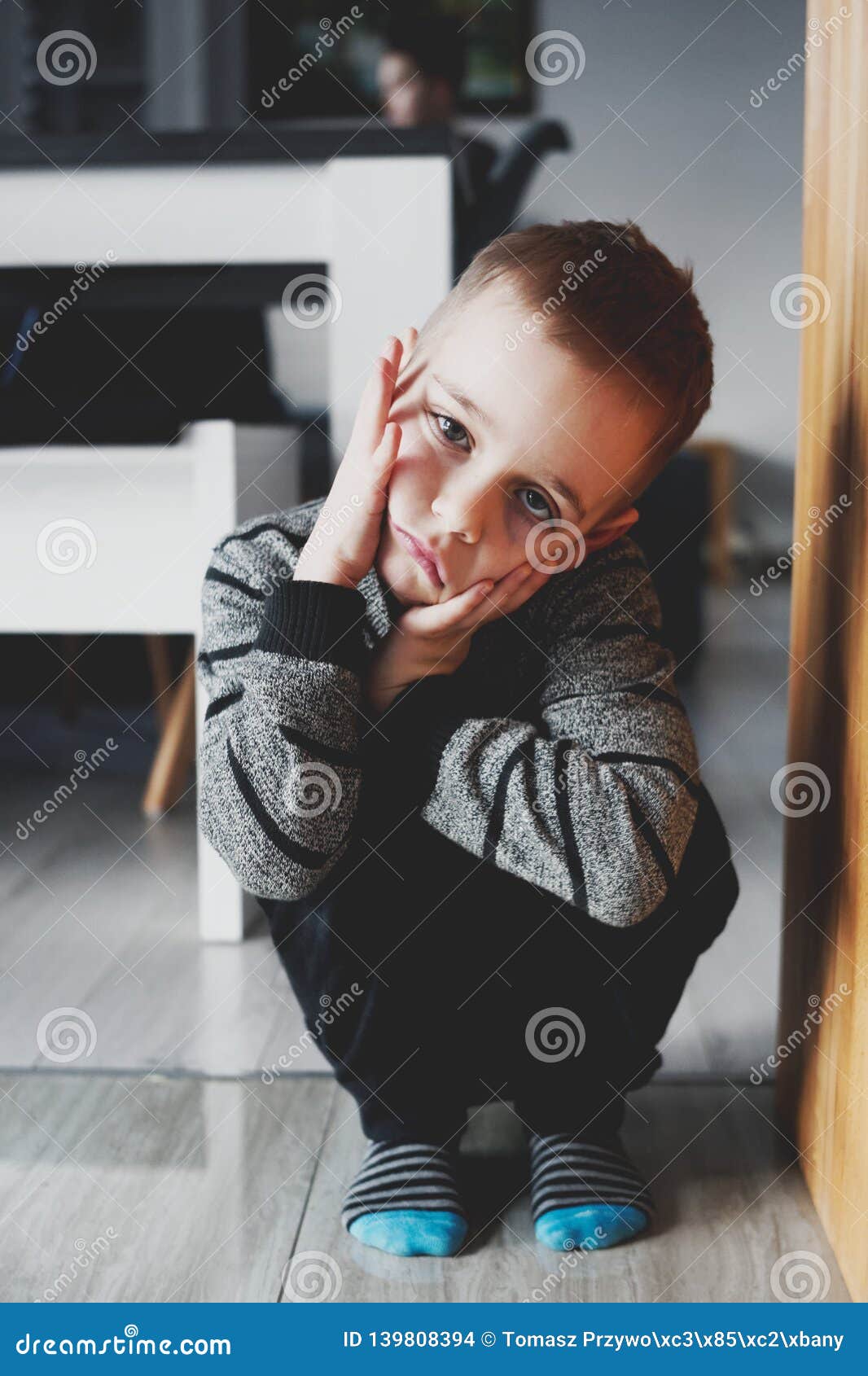 The little boy is very sad stock photo. Image of eating - 139808394