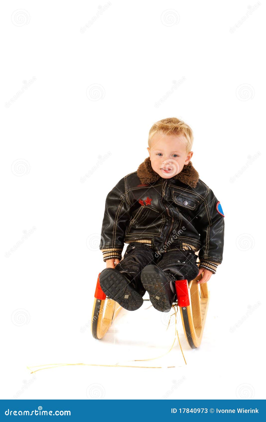 Little boy on the sledge stock image. Image of studio - 17840973