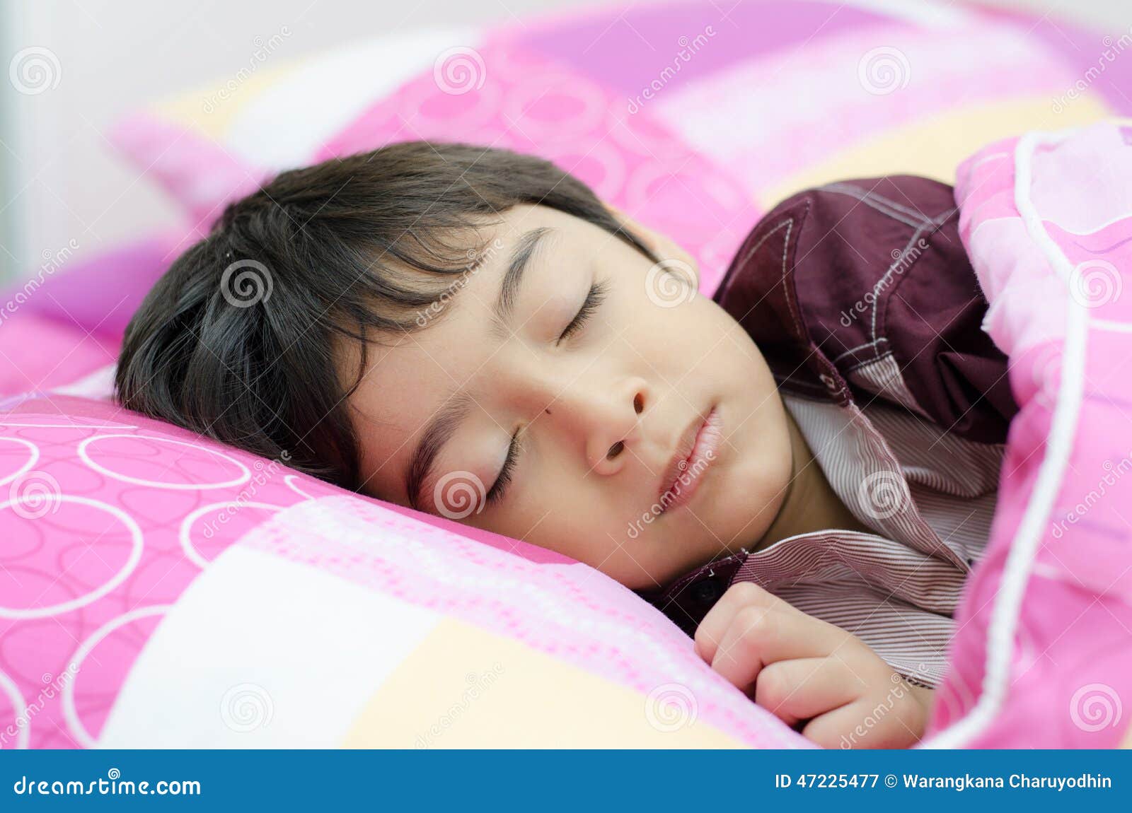 Little boy sleeping in bed stock image. Image of asleep - 47225477