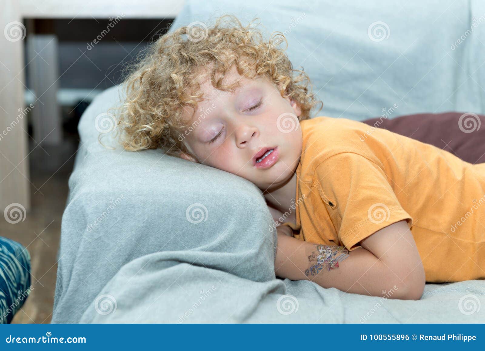Little Boy Sleeping on the Sofa Stock Photo - Image of caucasian ...