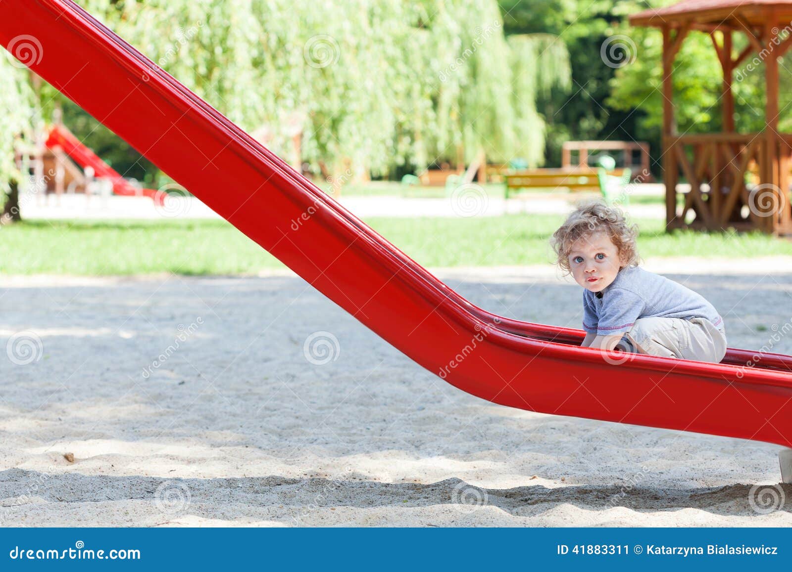 Little boy on slide stock image. Image of preschooler - 41883311