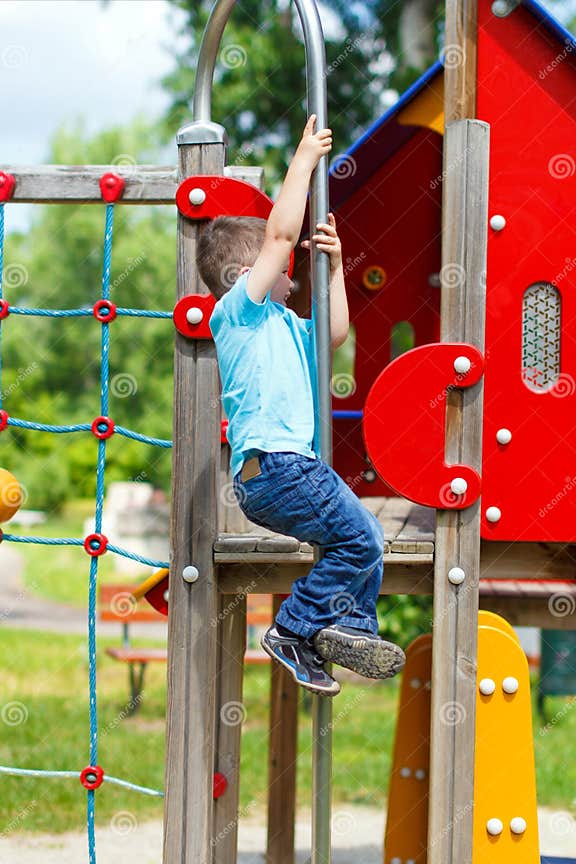 Little Boy Slip Down on the Pole at Playground Stock Image - Image of ...