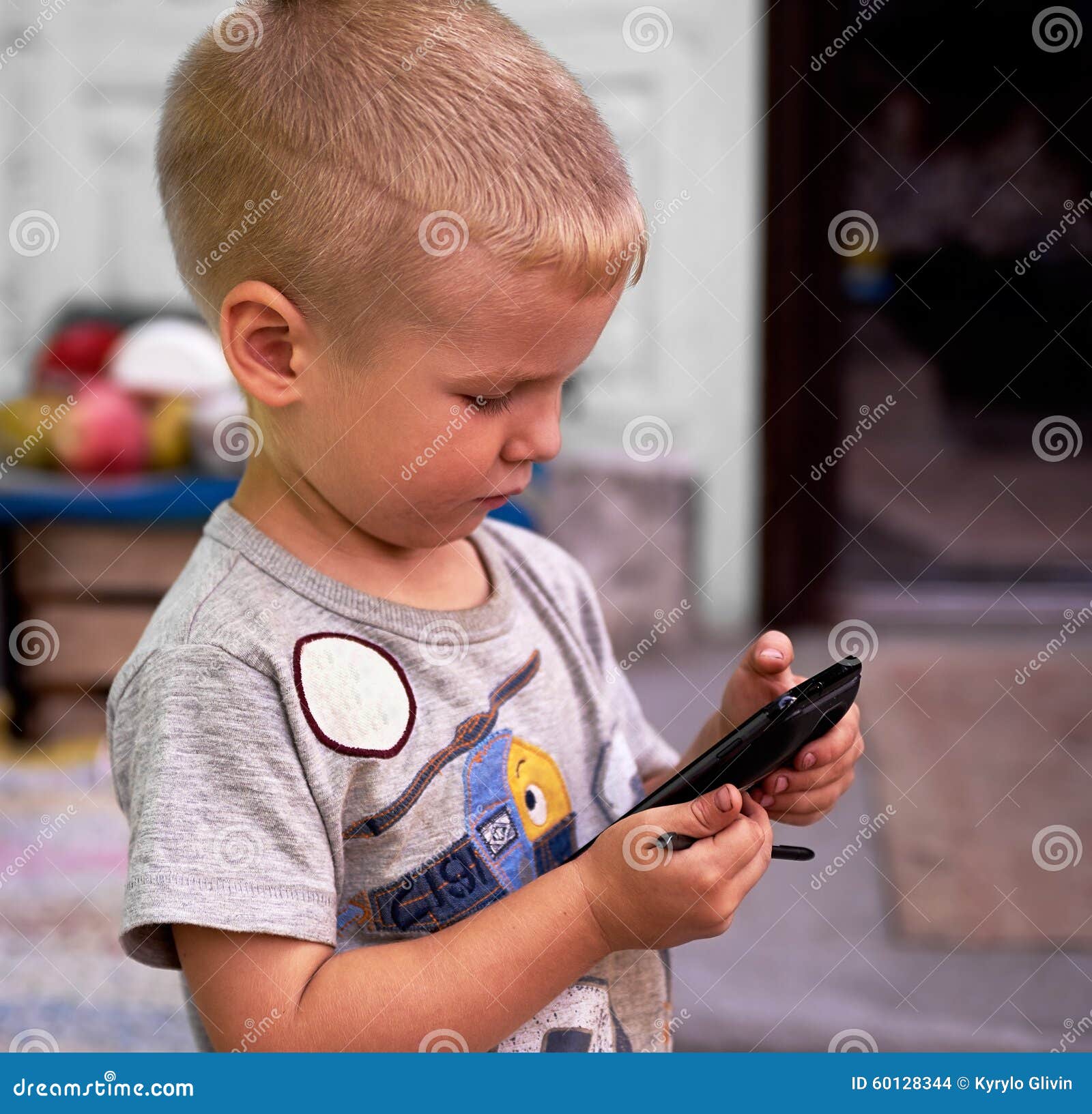 Little boy with smartphone stock photo. Image of text - 60128344