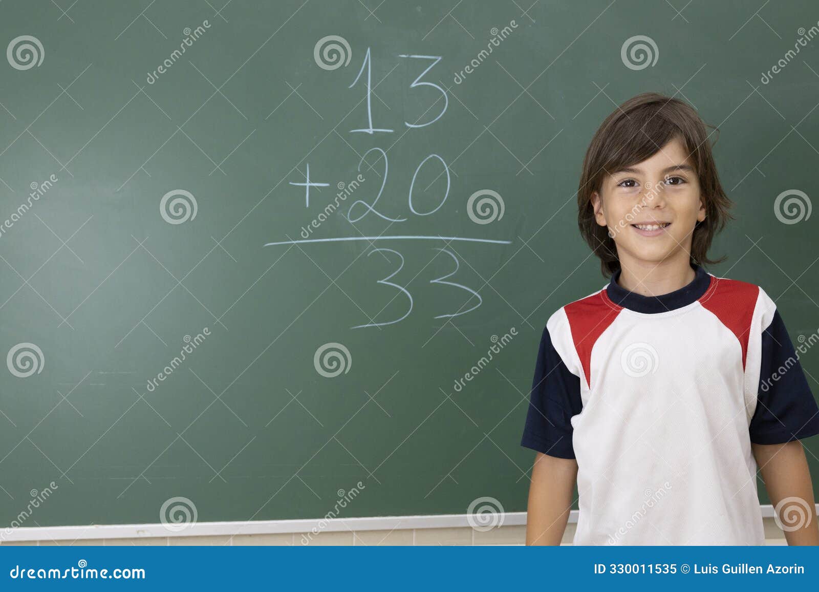 Boy Doing Math Operations on the School Blackboard. Stock Image - Image ...