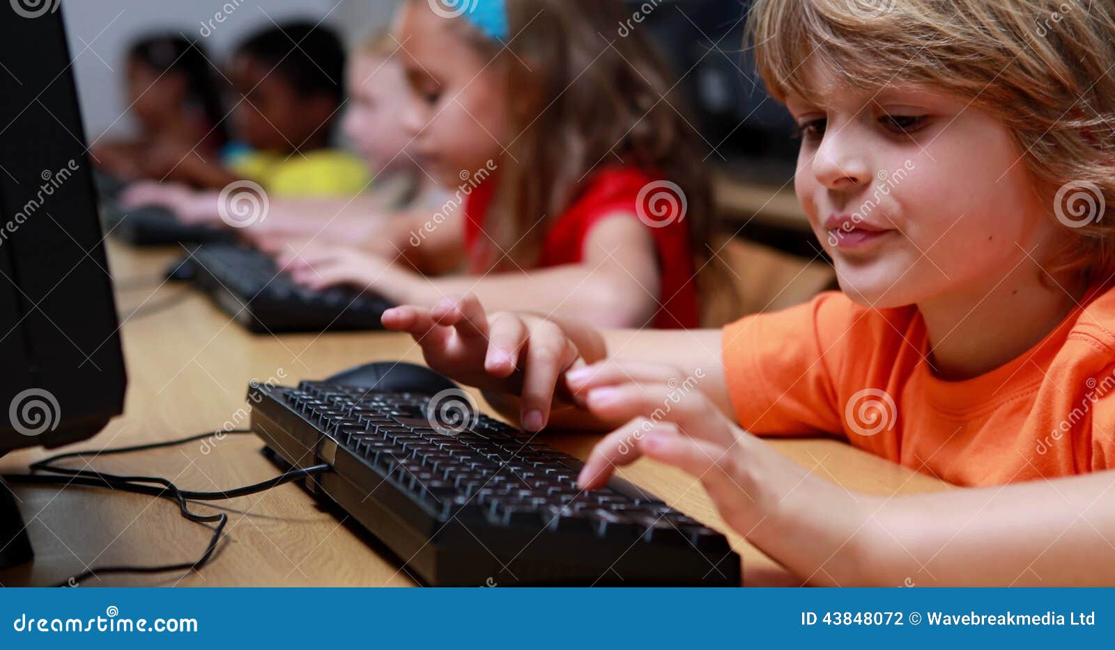 Little Boy Smiling at Camera during Computer Class Stock Footage ...