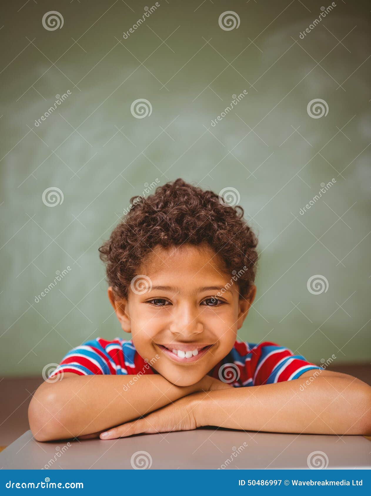 Little Boy Smiling in Classroom Stock Image - Image of face, brown ...