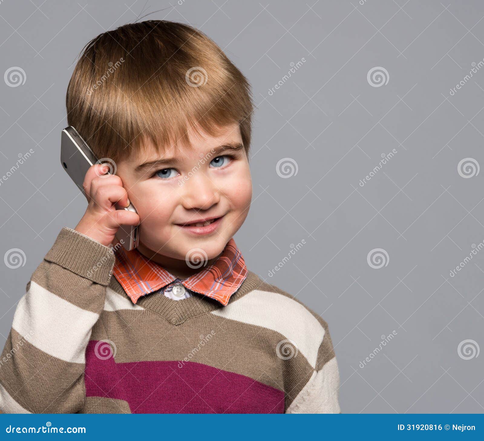 Little boy smiling stock photo. Image of cellphone, child - 31920816