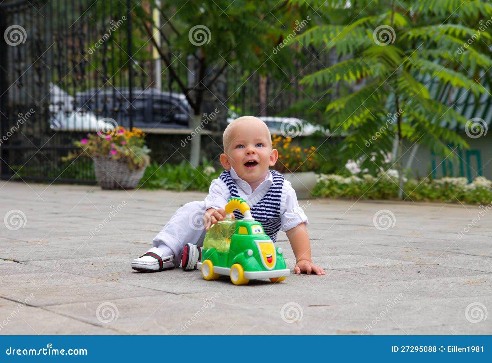 Little Boy Smiling and Playing in the Toy Car Stock Photo - Image of ...