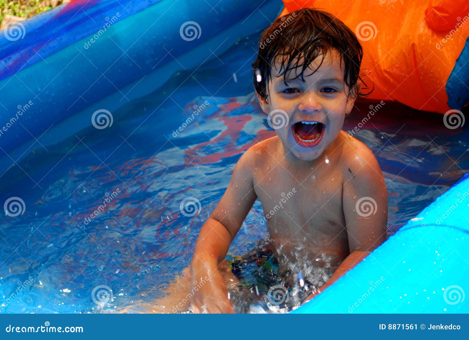 Little Boy Smiling and Splashing in a Pool Stock Image - Image of ...