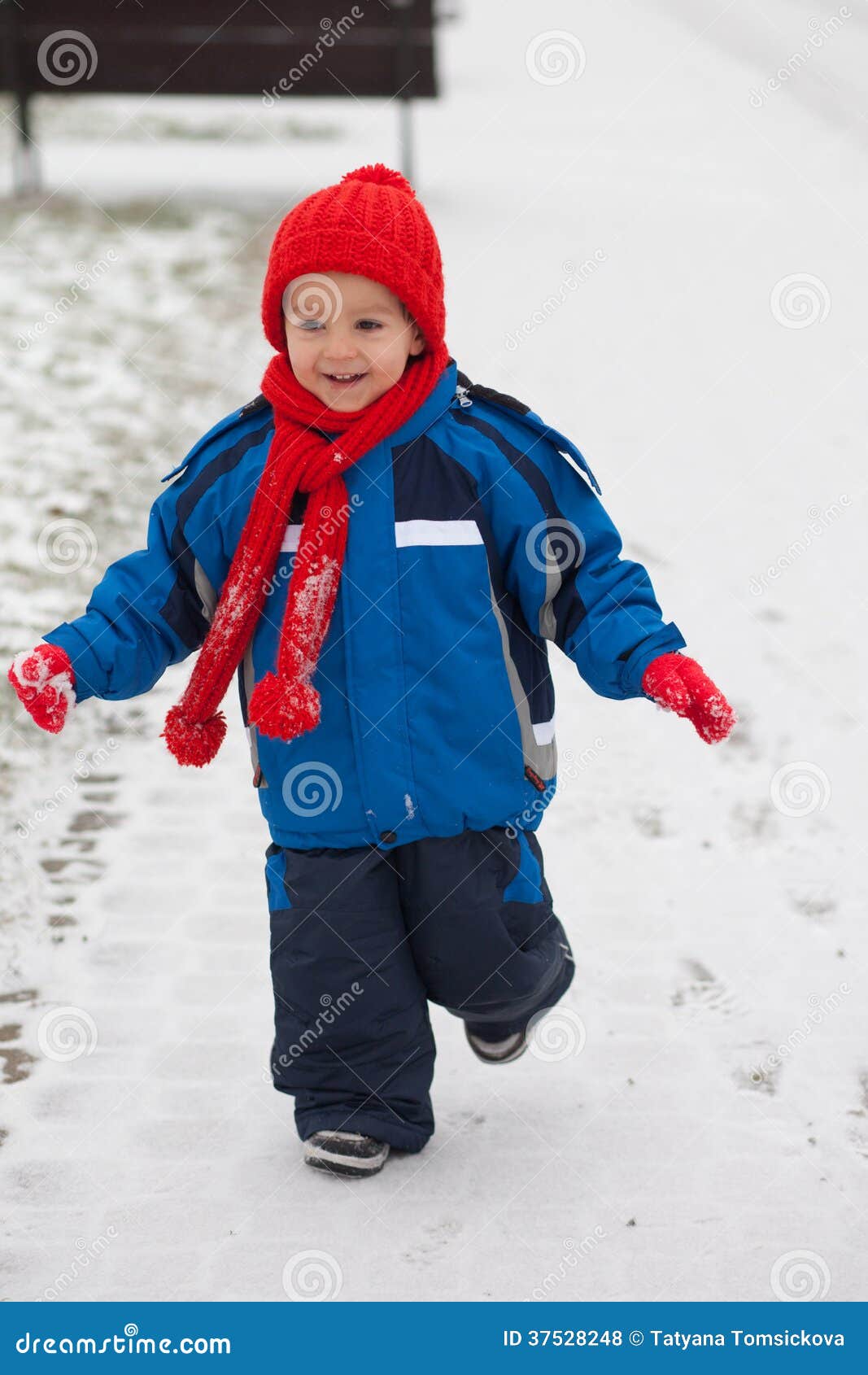 Little boy in the snow stock photo. Image of colors, life - 37528248