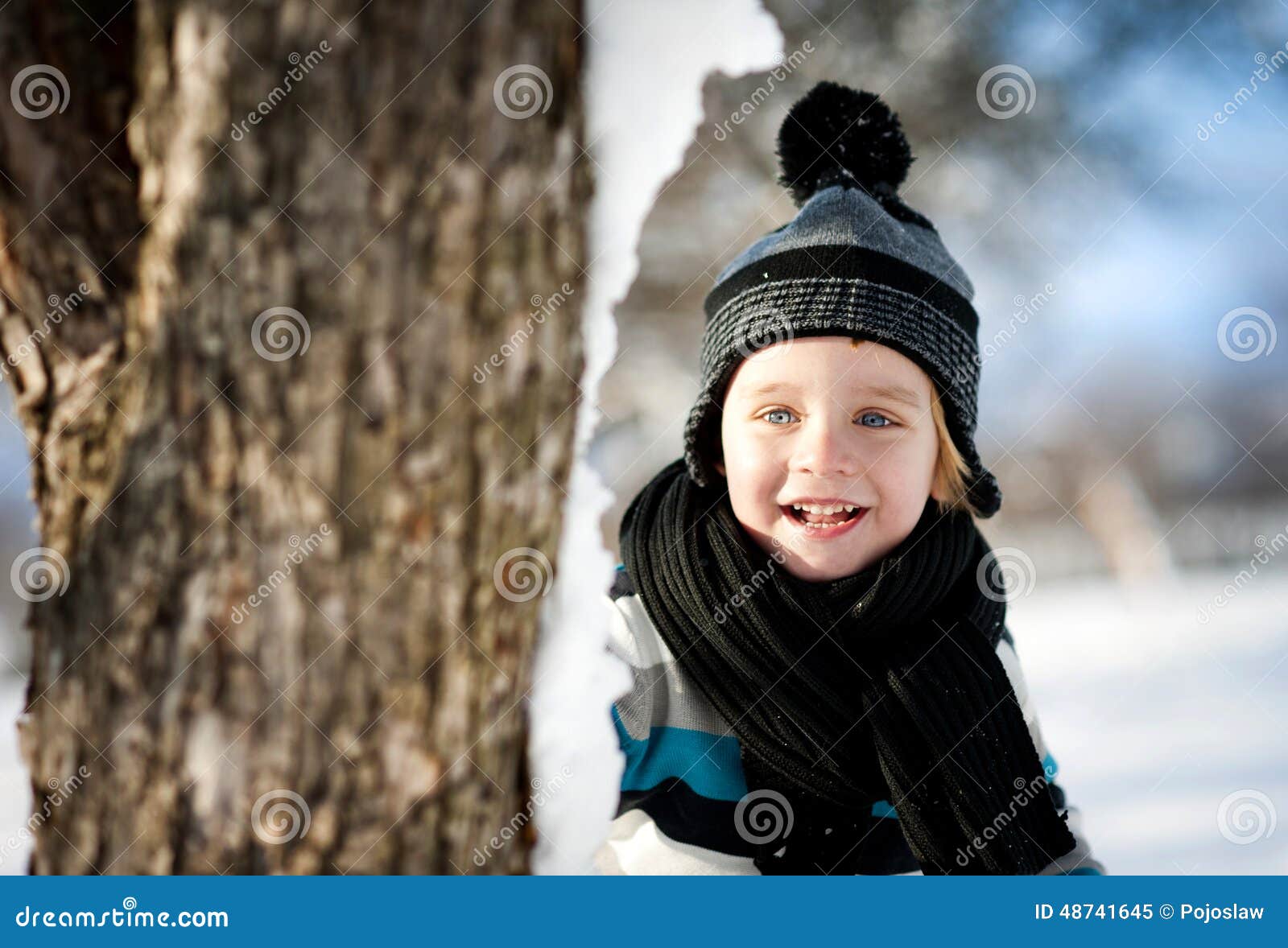 Little boy in the snow. stock image. Image of running - 48741645