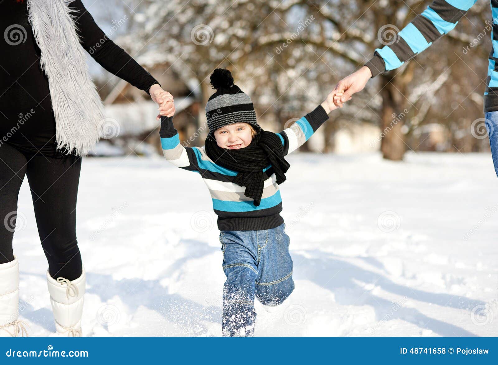 Little boy in the snow. stock photo. Image of snow, season - 48741658