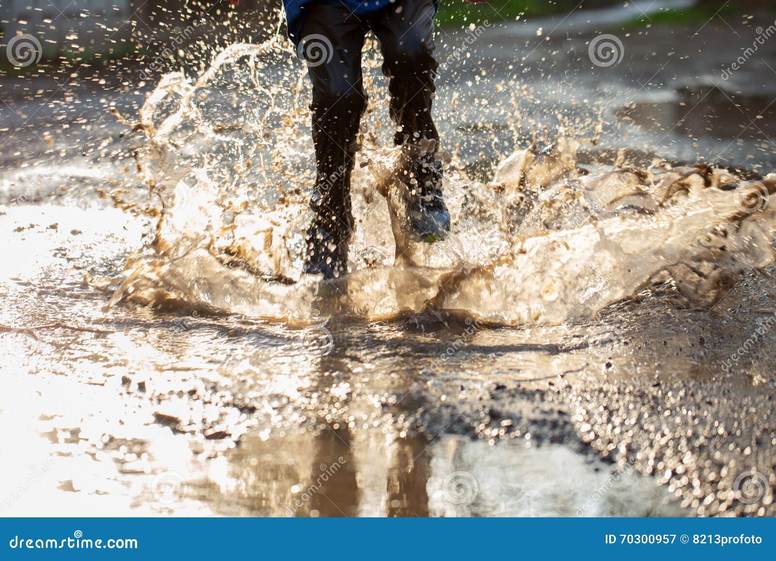 Little Boy Splashing In A Mud Puddle, Royalty-Free Stock Photography ...