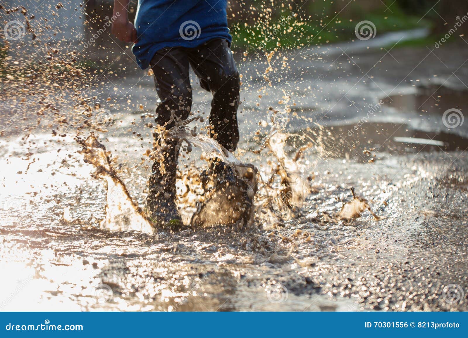 Little Boy Splashing In A Mud Puddle, Royalty-Free Stock Photography ...
