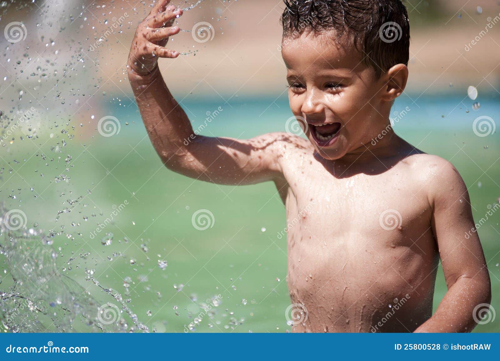 Little boy splashing water stock photo. Image of energy - 25800528