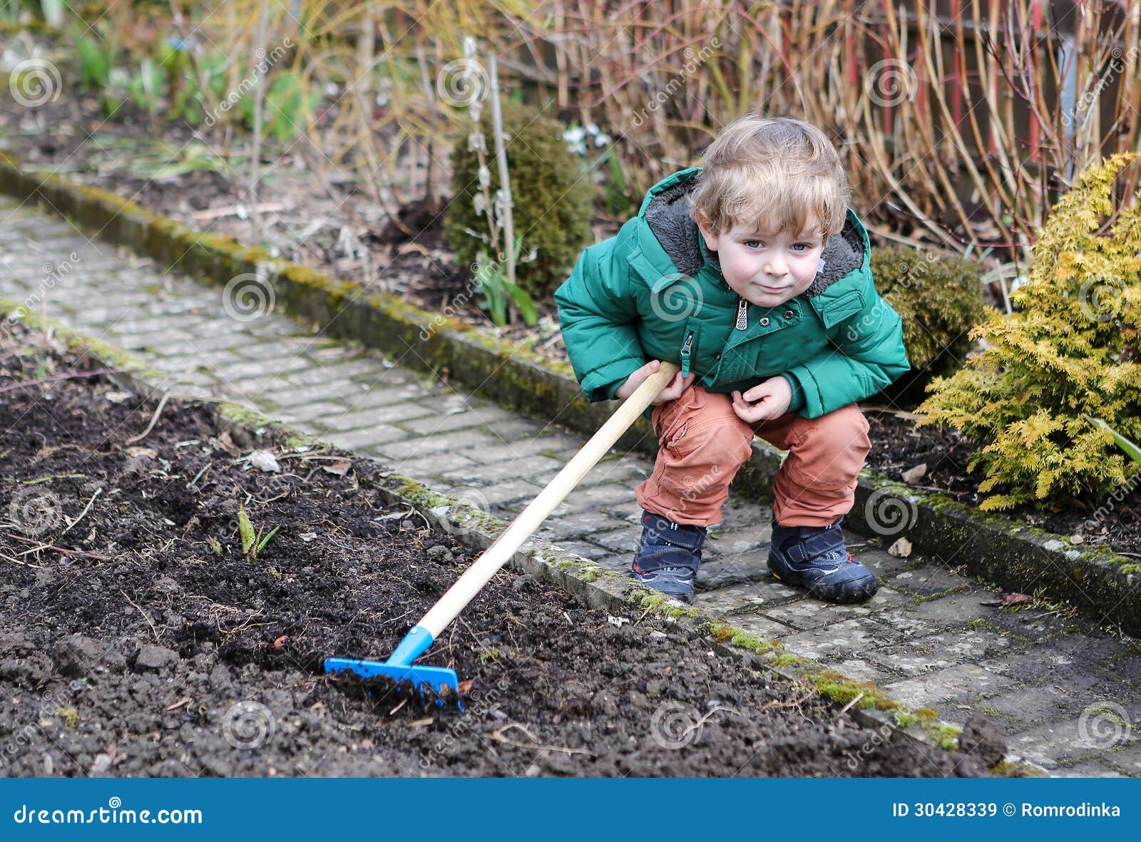 Little Boy in Spring with Garden Hoe Stock Image - Image of grow ...