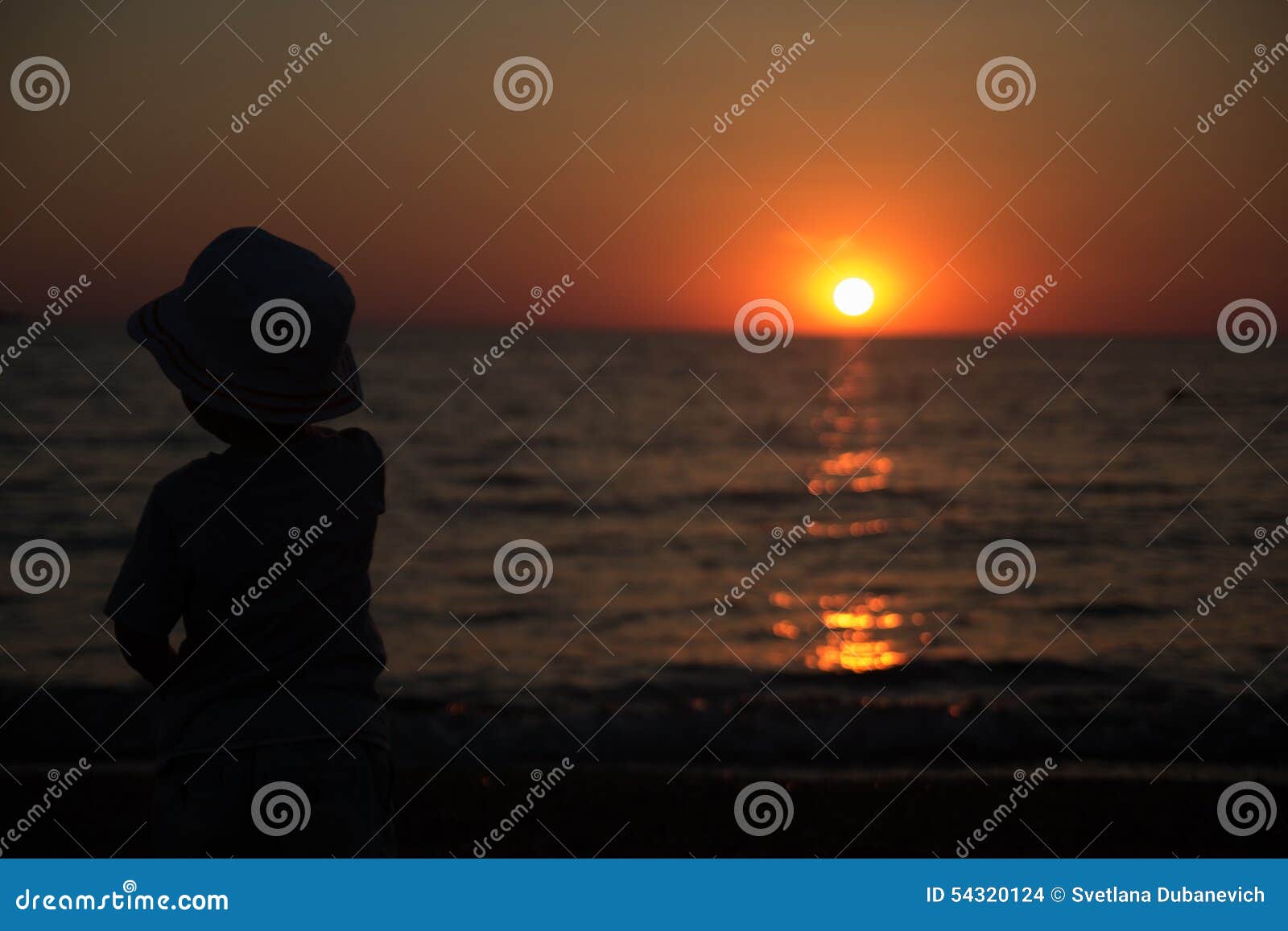 Little Boy Standing Back and Watching the Sunset Stock Photo - Image of ...
