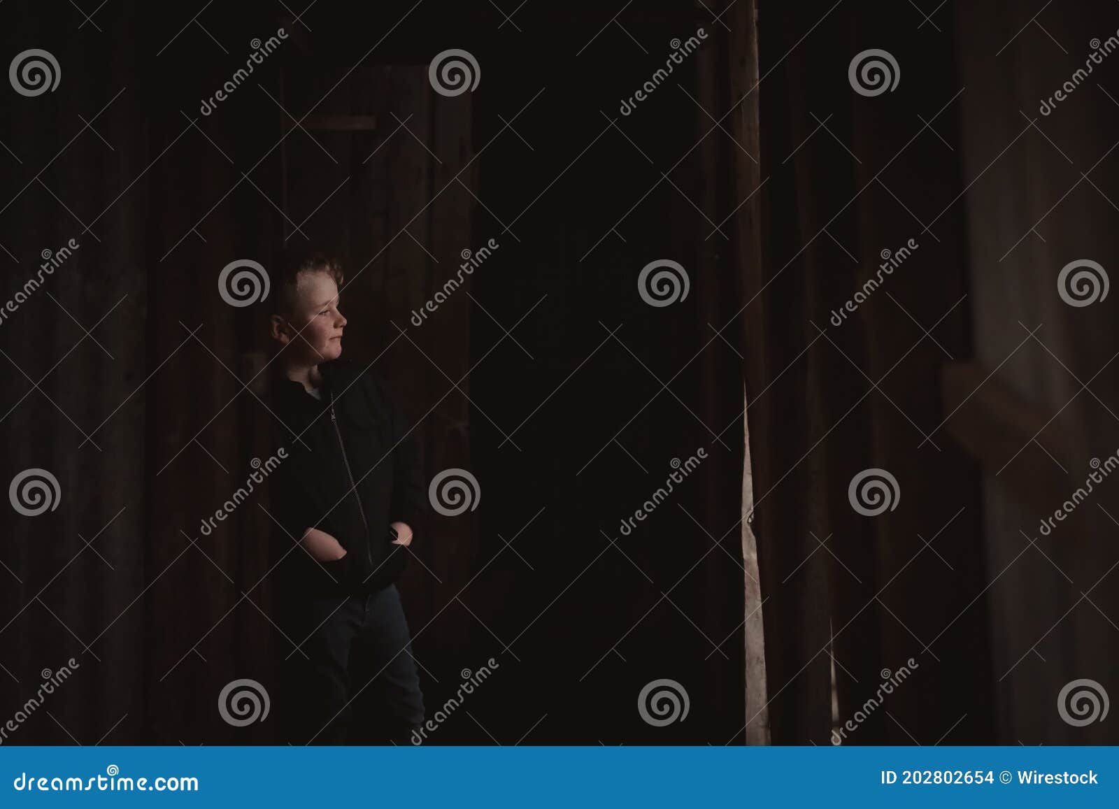 Little Boy Standing in a Dark Room Stock Photo - Image of little ...