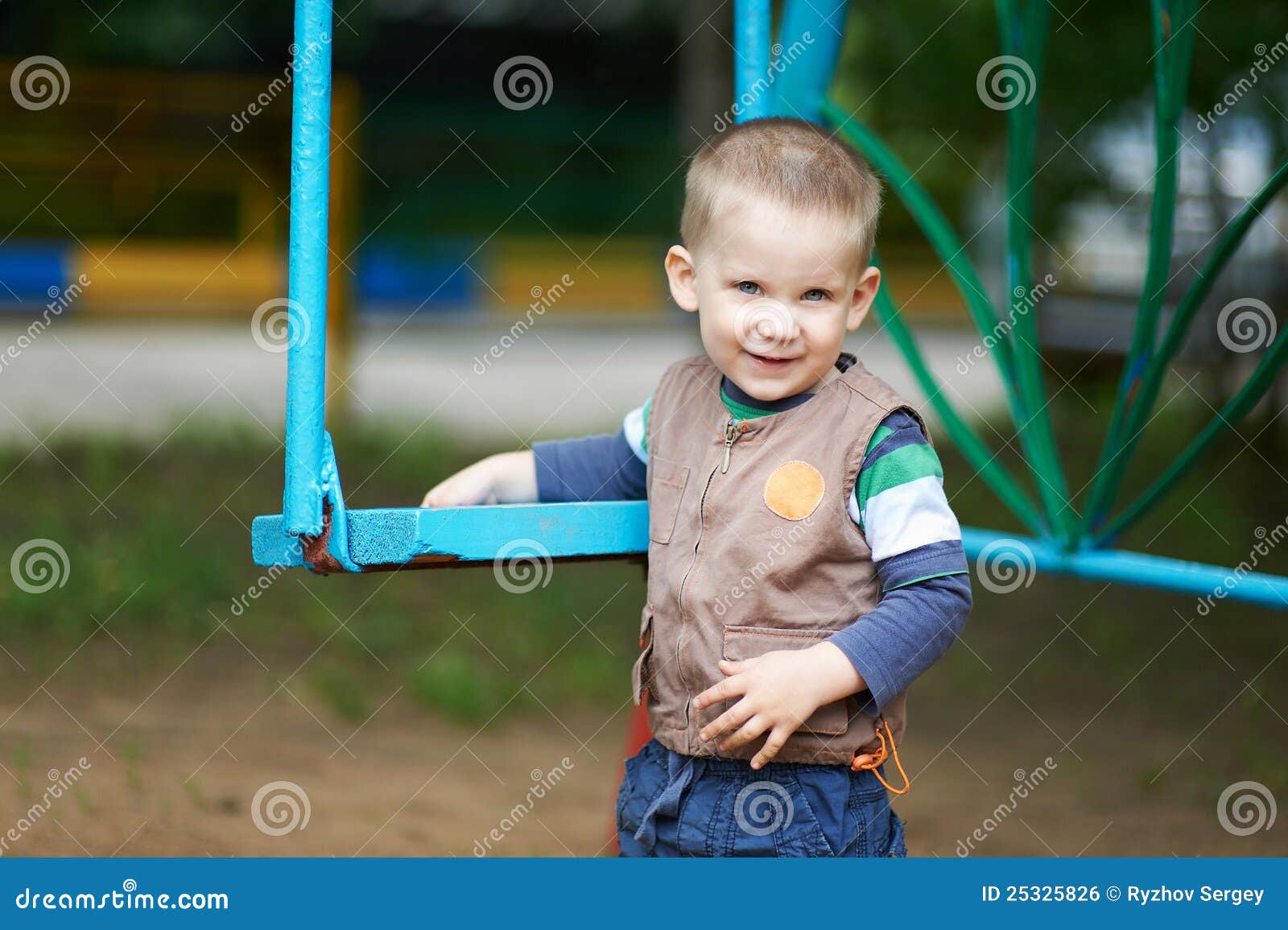 Little Boy Stands Near the Swings Stock Photo - Image of funny, green ...