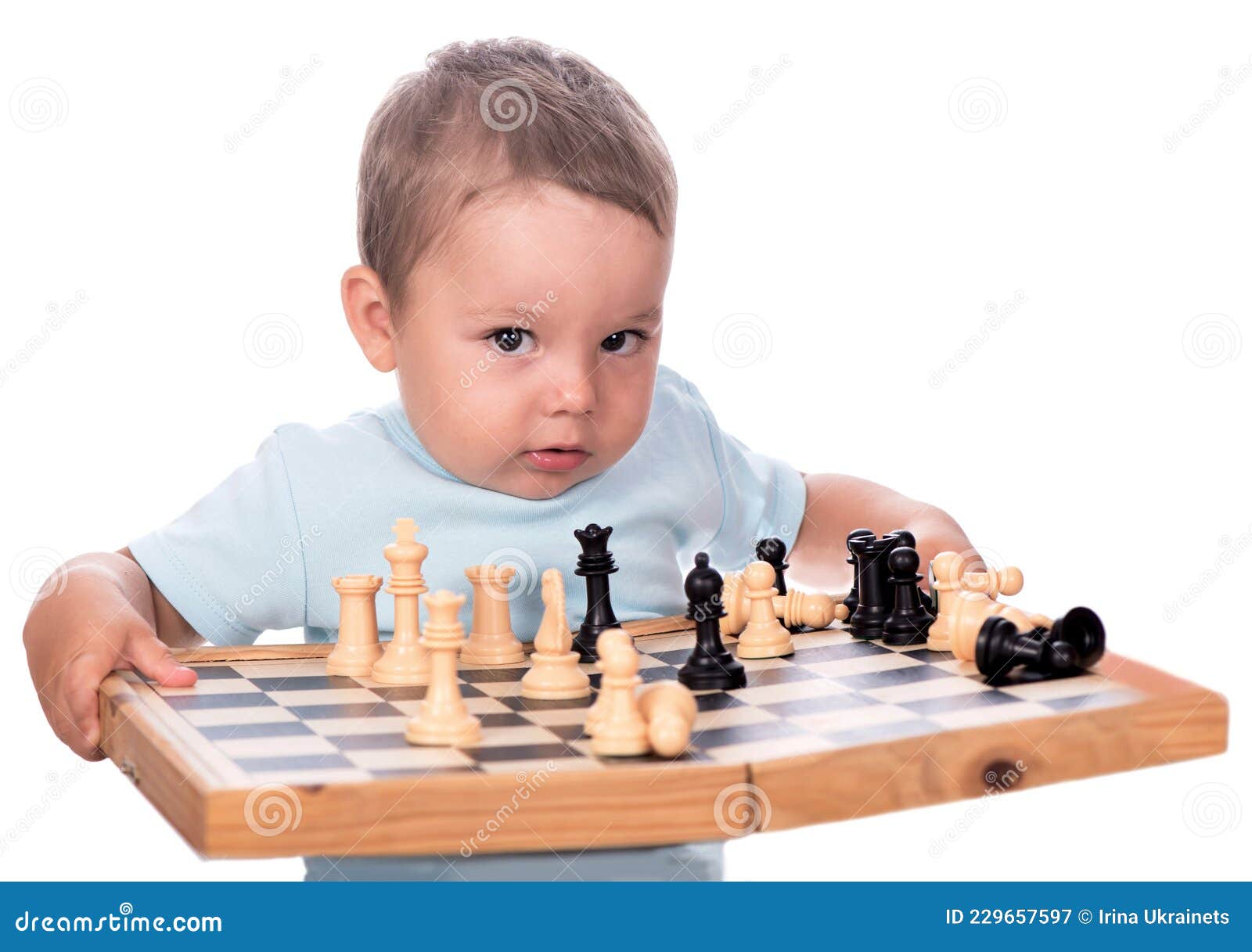 Little Boy Staring at the Chess Pieces Isolated on White Background ...