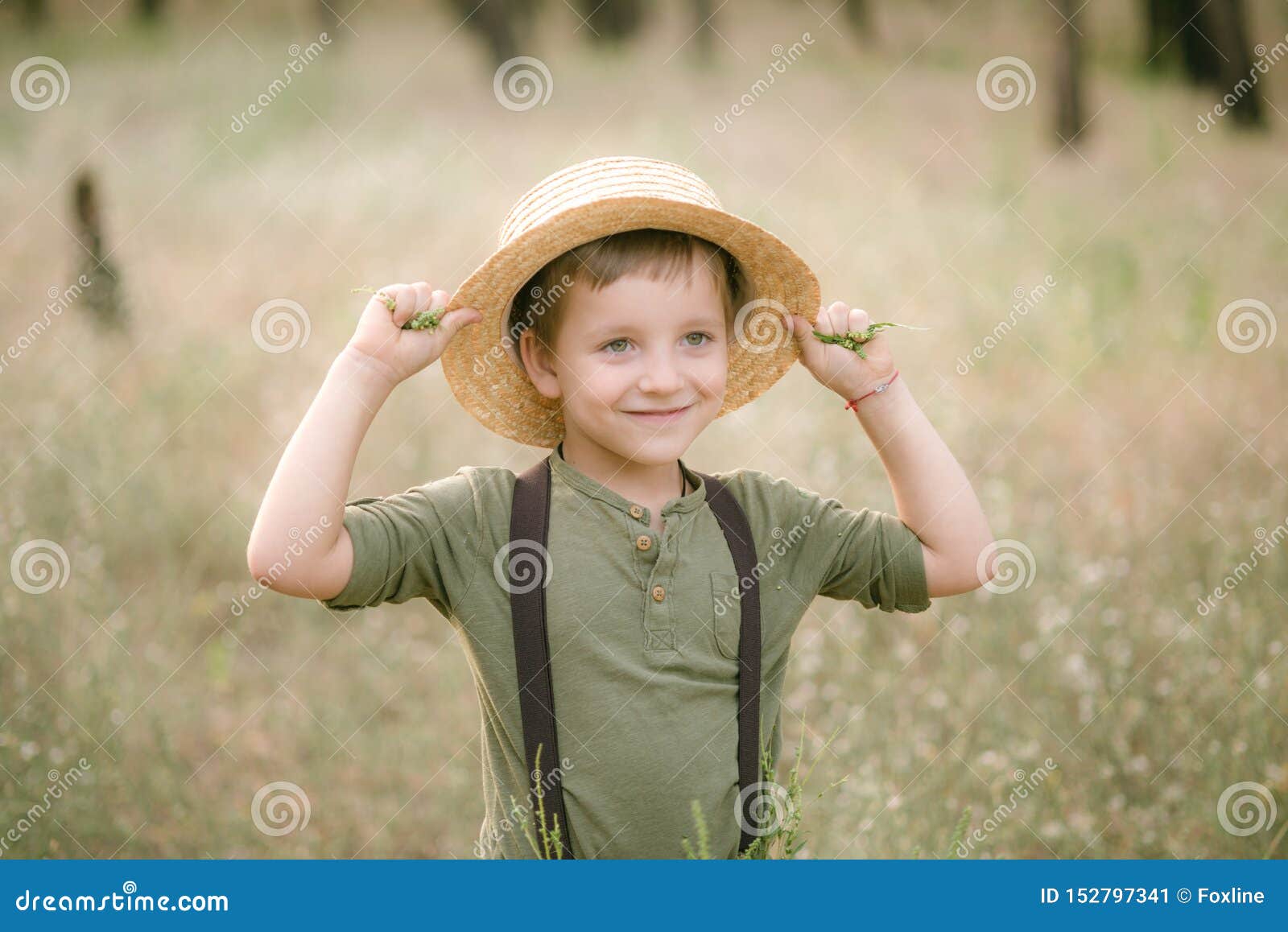 Little Boy in a Straw Hat in the Park in the Summer Stock Image - Image ...
