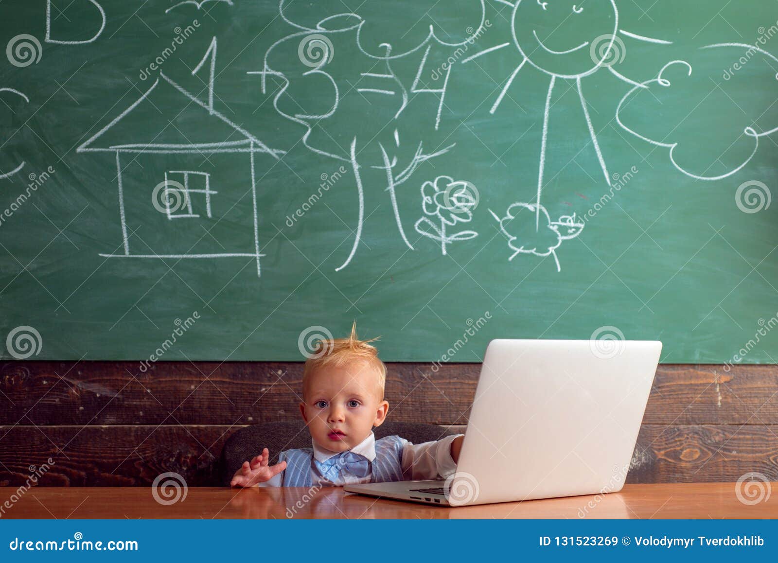 Little Boy Study in School Using Laptop. Study Computer Science or ...